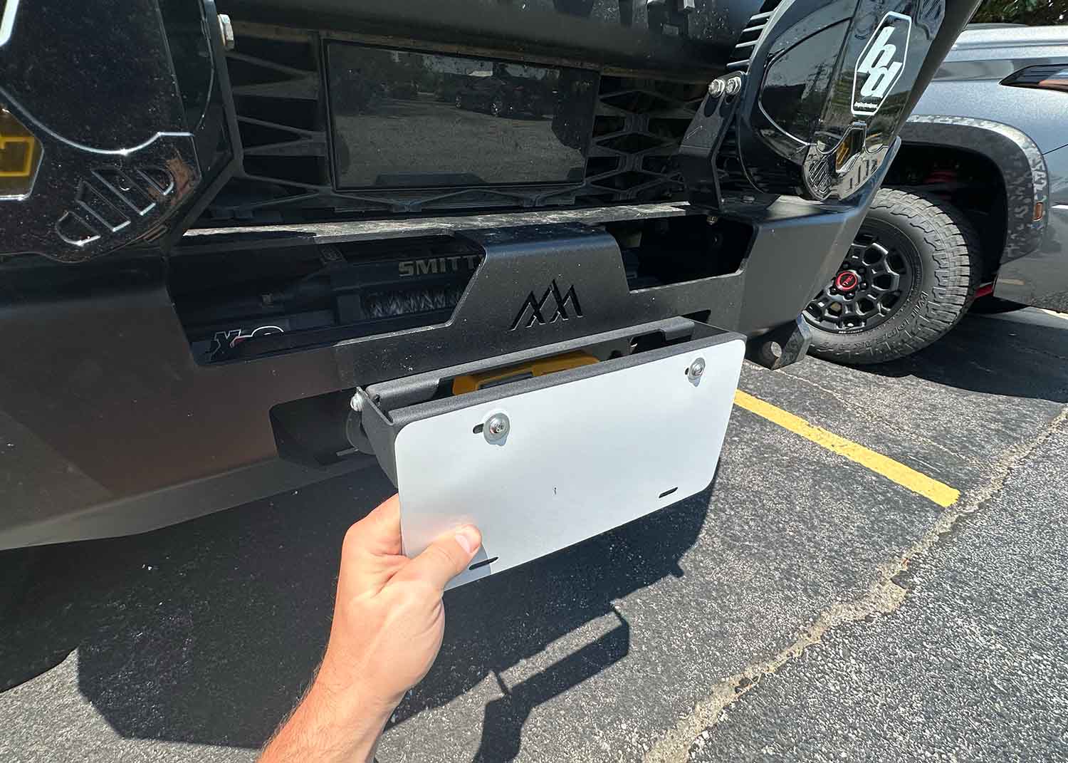 Flip Up Front License Plate Holder - Hawse Fairlead – NOMADICA Outfitters